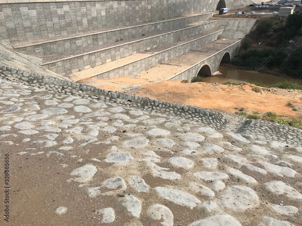 Rip rap works around a massive construction of road crossing culvert ...