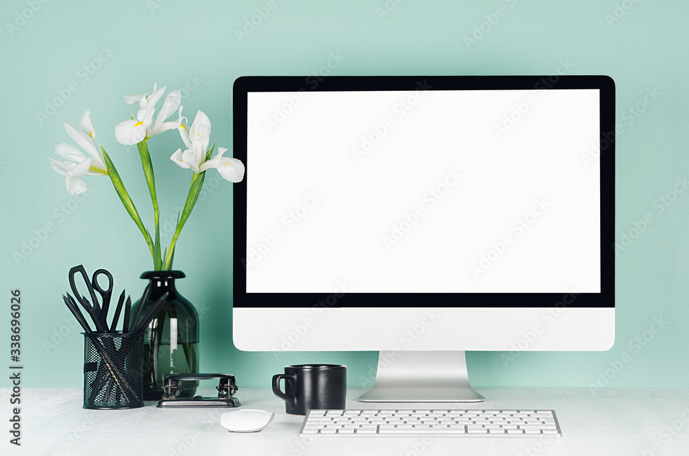 Minimalistic office interior with blank computer monitor, black ...