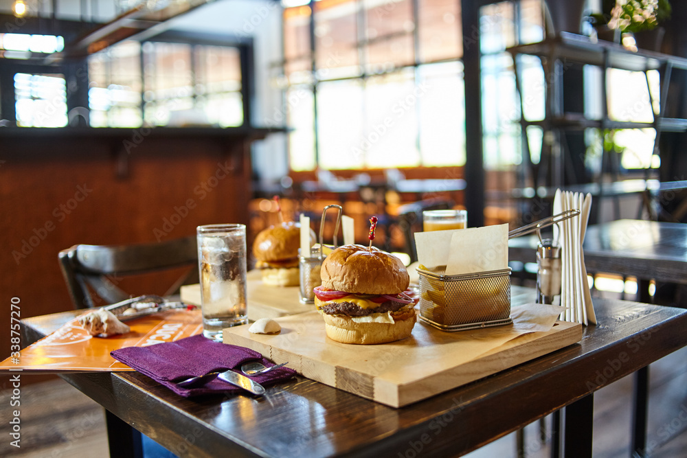 Menu presentation - traditional american burgers on wooden underlays in ...