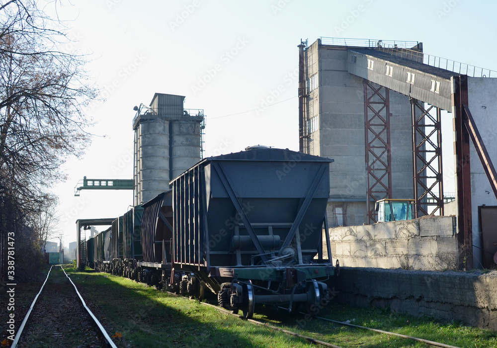 Railroad cars at cement manufacturing plant. Ready-mix and building ...