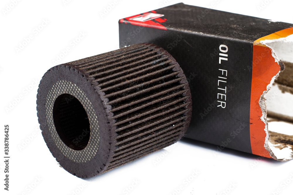 Old and dirty oil filter isolated on white background.Copy space Stock ...