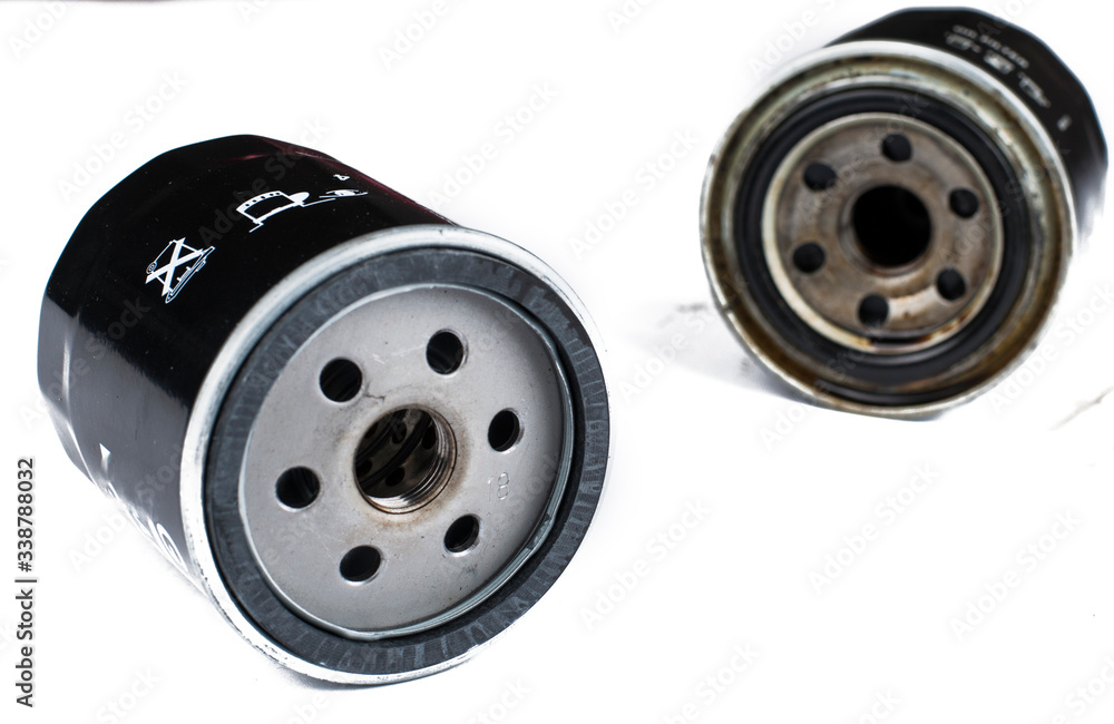 Old and new oil filter isolated on white background.Copy space Stock ...