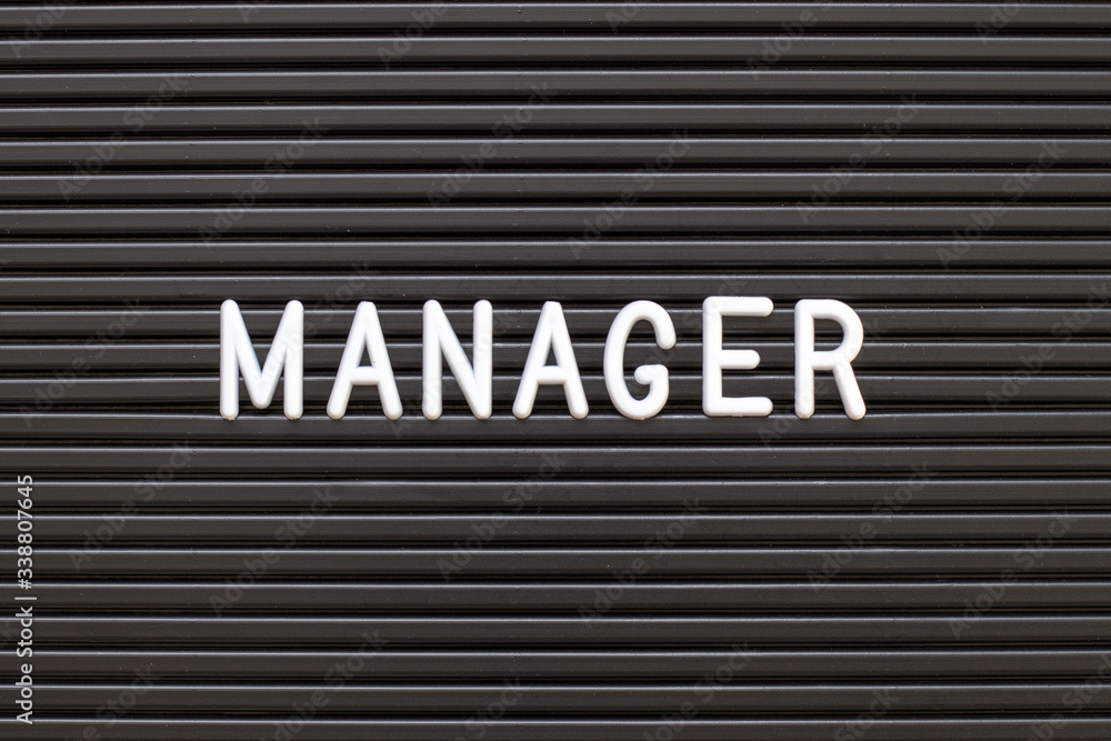 Black color felt letter board with white alphabet in word manager ...