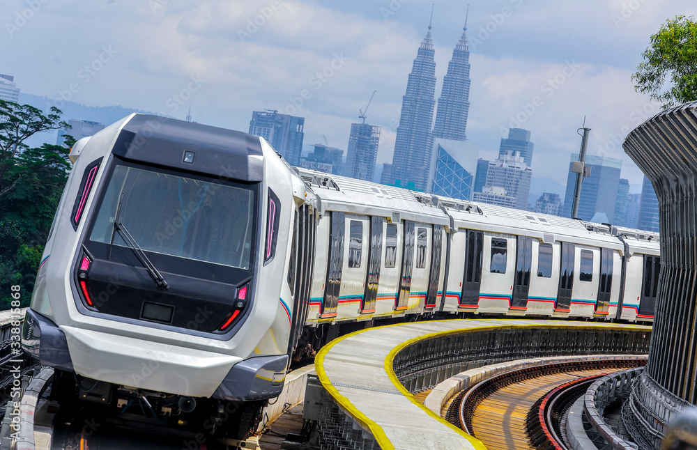 Malaysia Mass Rapid Transit (MRT) train with a background of Kuala ...