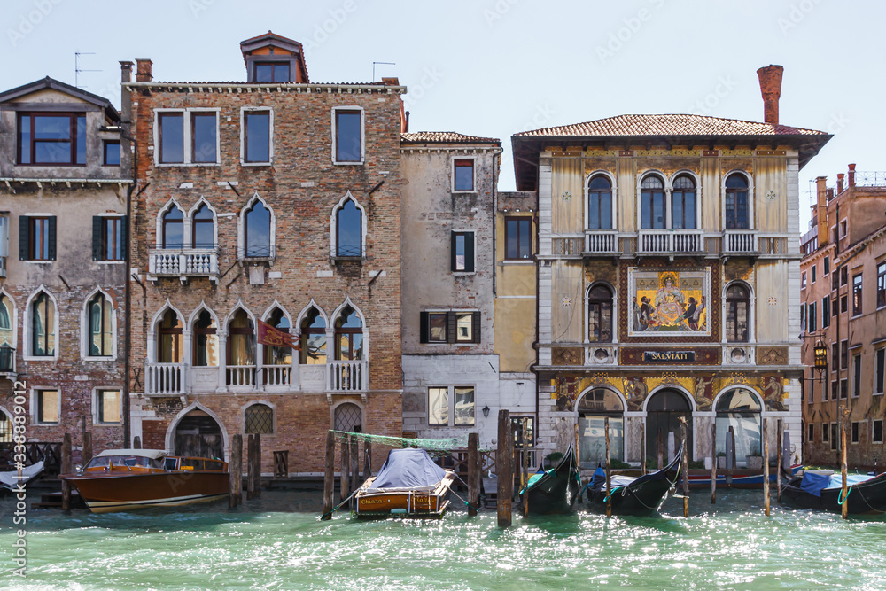 Water channels of Venice city. Facades of residential buildings ...
