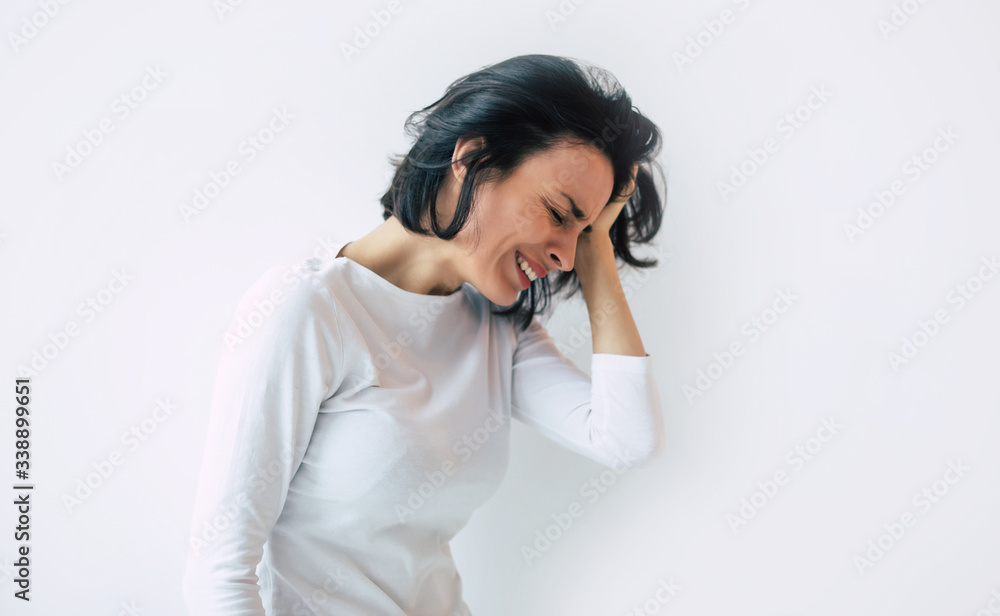 Feeling despair. Close-up photo of a young woman who is crying and ...