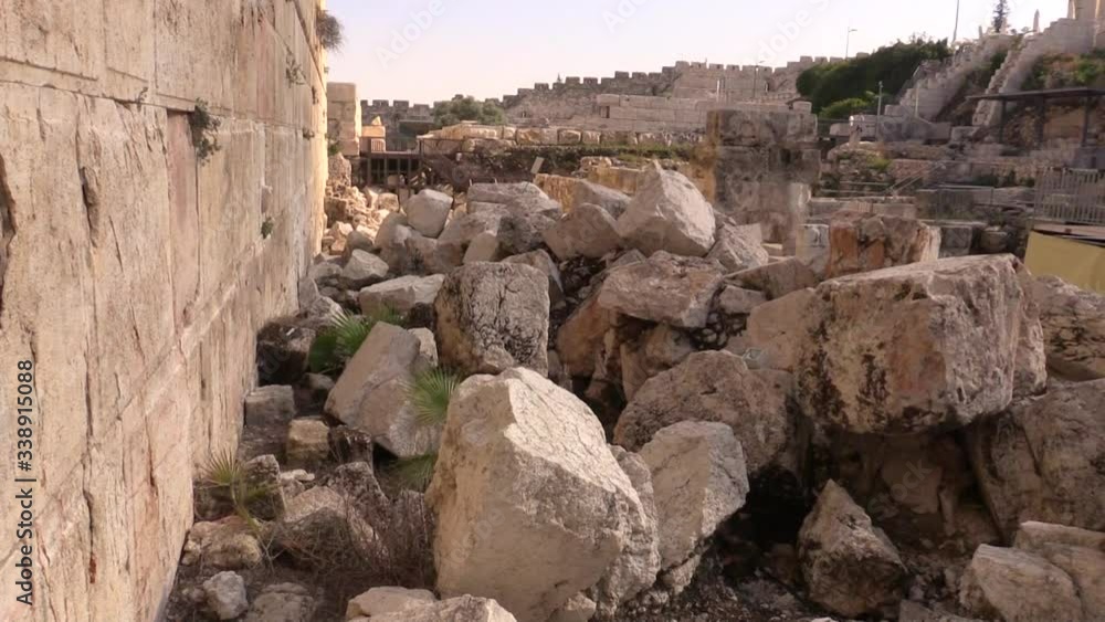 remains of the rubble in the temple precinct after the Roman conquest ...