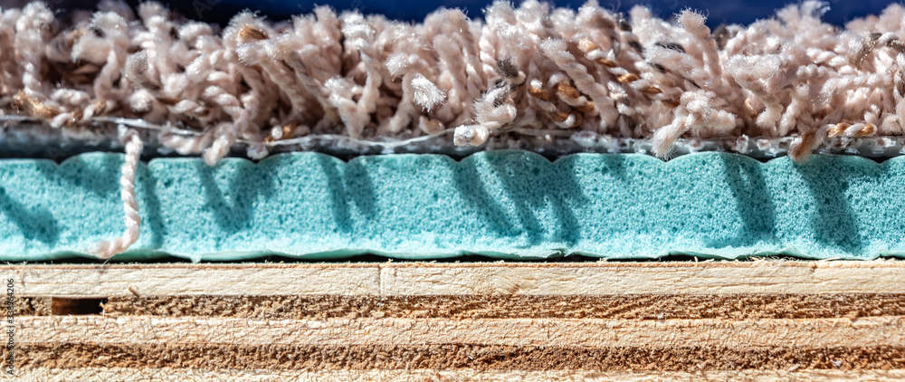 Carpet, padding, and plywood layers for installation of flooring Stock ...