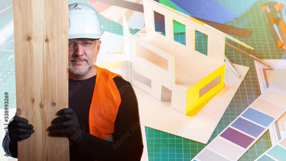 Builder next to the house layout and color palettes. Finishing work in ...