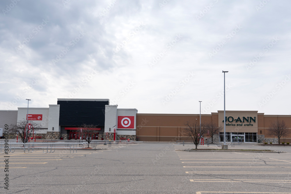 Empty parking lot in front of Target and Joann Fabric stores during ...