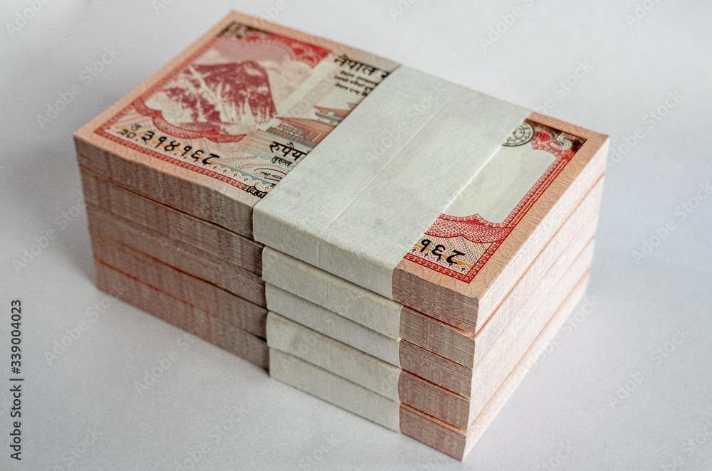 A Nepal paper currency banknote isolated on a white background. Stock ...