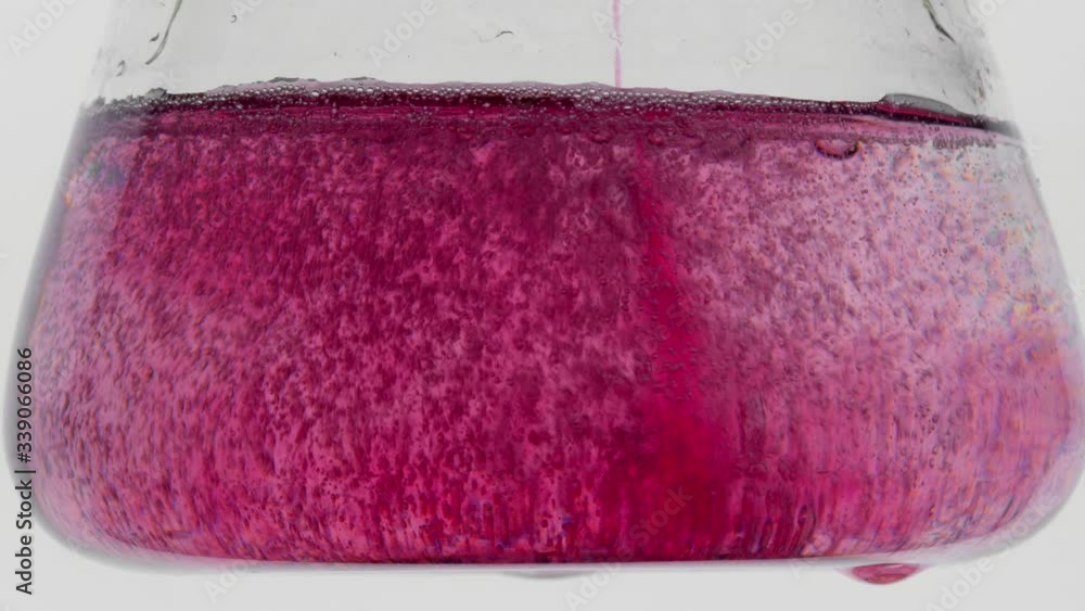 Close-up shooting. Adding a pink element to a transparent one and their ...