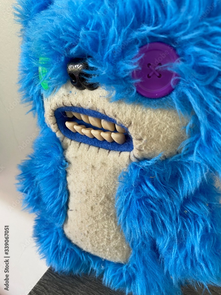 ugly scary monster fugler, plush toy blue, with teeth like a human ...