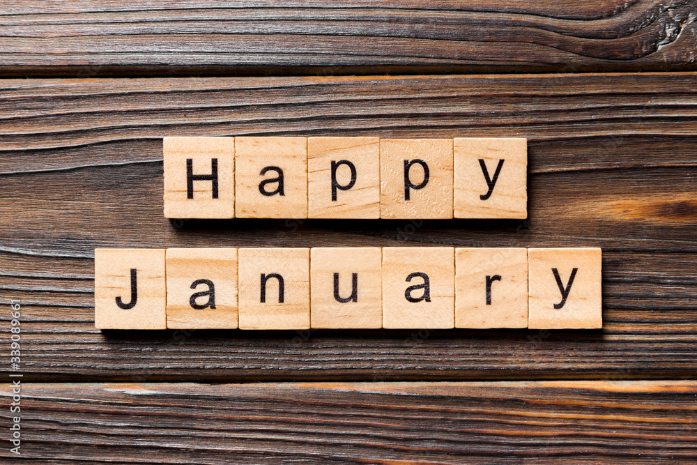 Happy january word written on wood block. Happy january text on table ...