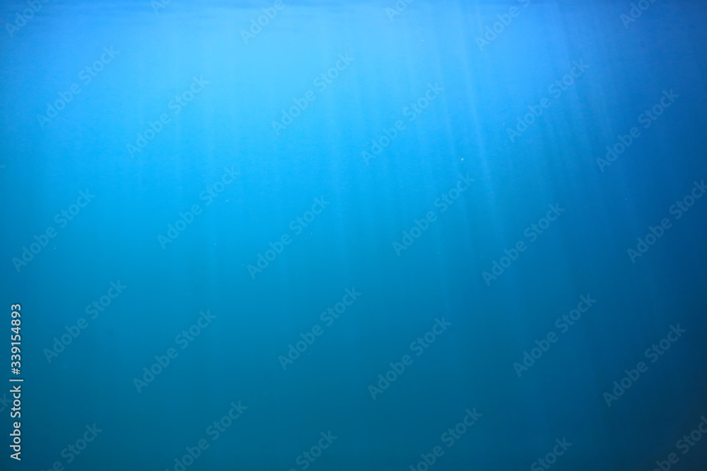 ocean water blue background underwater rays sun / abstract blue ...