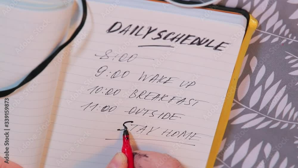 Stay home COVID 19. Diary of a businessman. Strikethrough time plan of ...