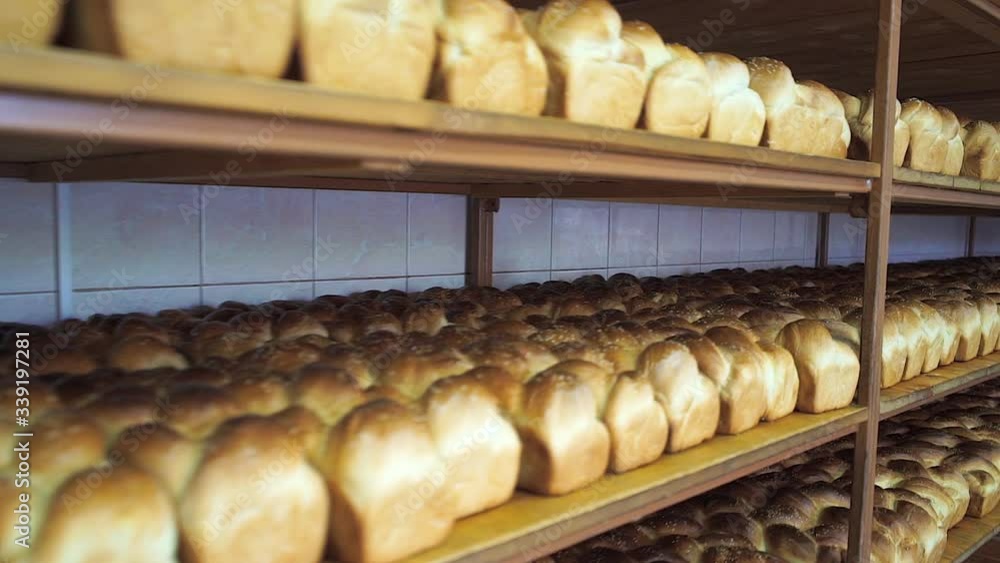Making a loaf of bread in the bakery. Loaf of bread on the production ...