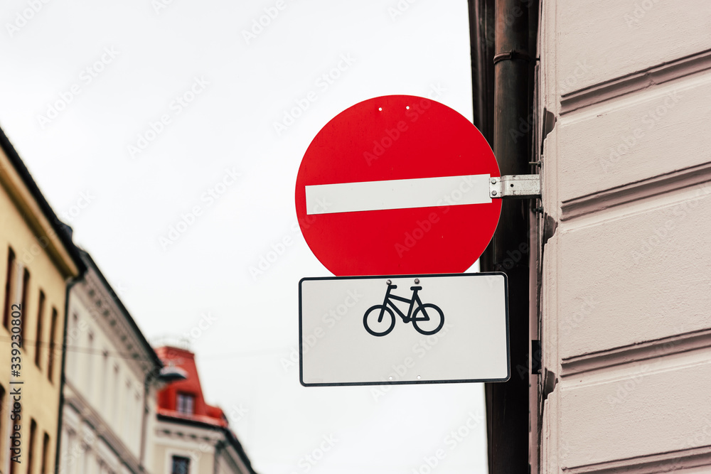 No entry sign for vehicular traffic except bicycles. Road sign against ...