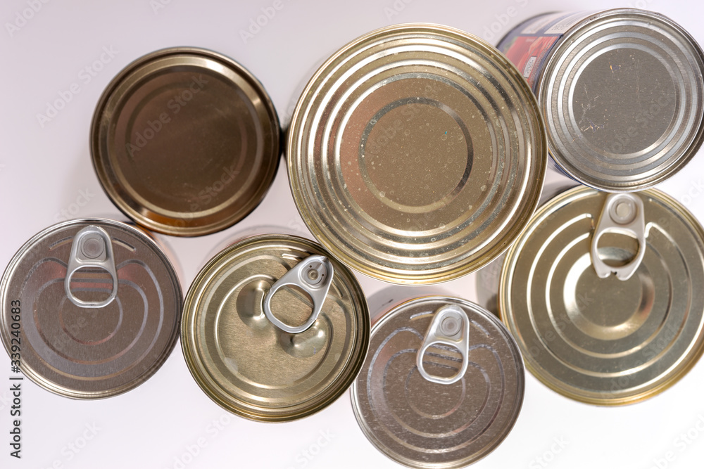 Various canned food in metal cans, top view. Canned goods non ...