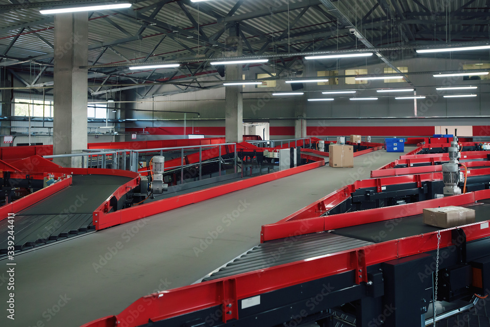 conveyor sorting belt at distribution warehouse. Distribution hub for ...