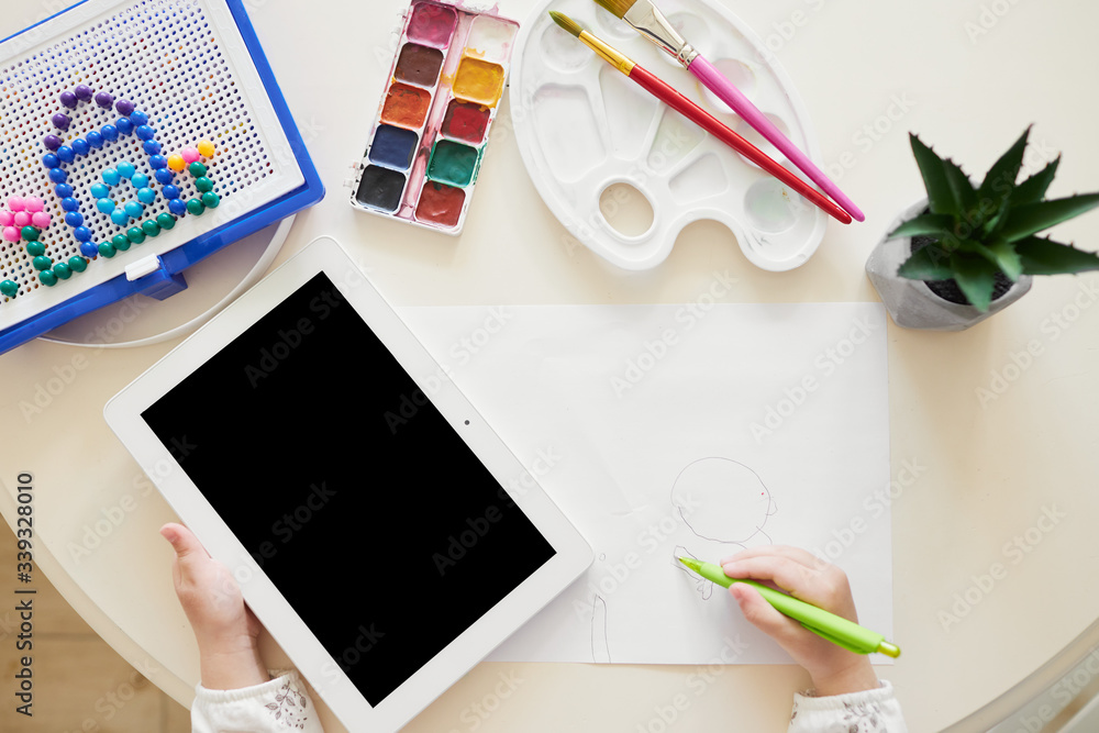 Online Education concept. Smart Little child girl using tablet for ...