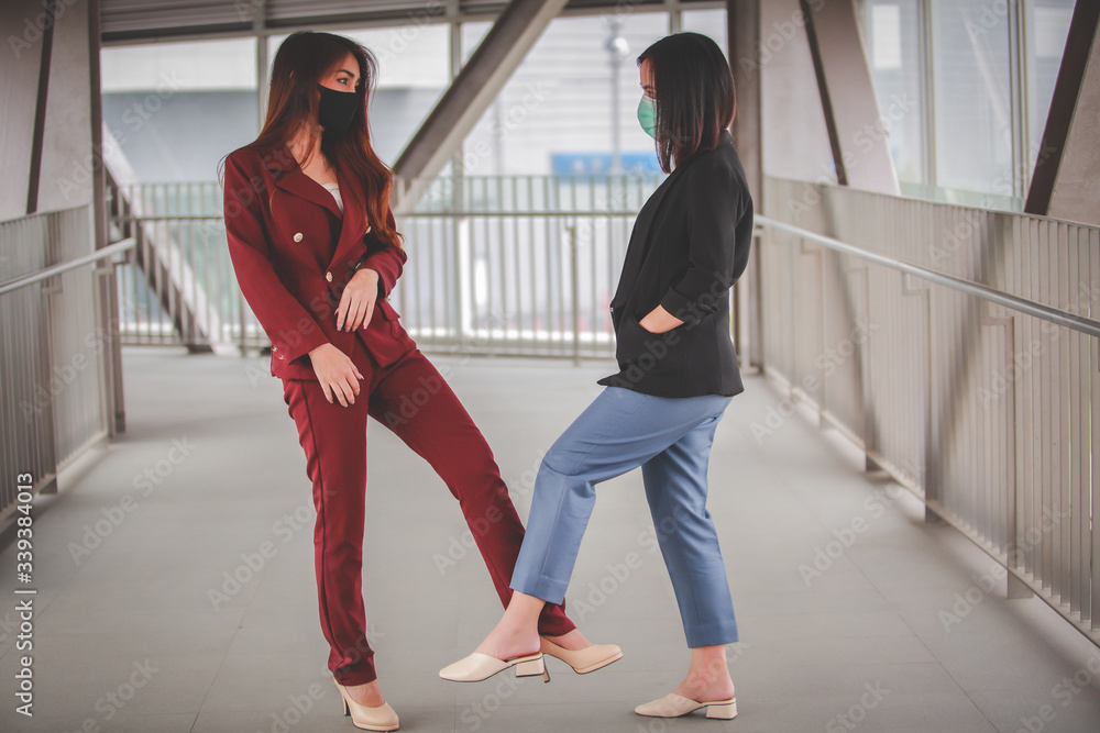 Foot tap. New novel greeting to avoid the spread of corona virus. Two ...