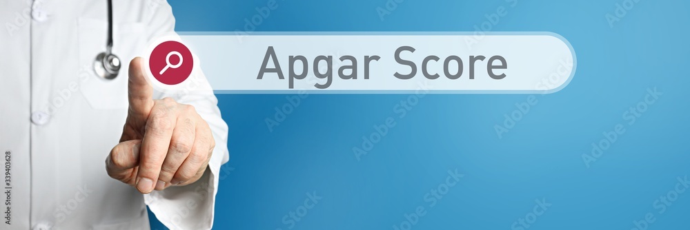 Foto de Apgar Score. Doctor in smock points with his finger to a search ...