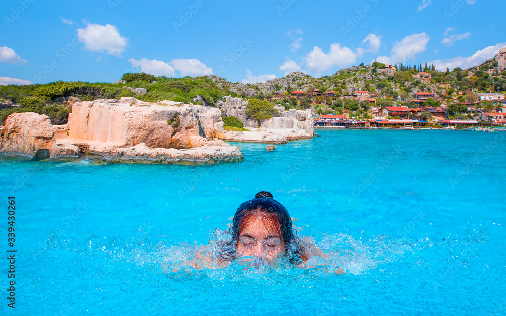 Young girl swimming in Blue Lagoon Kekova island (Ucagiz - Kale ...