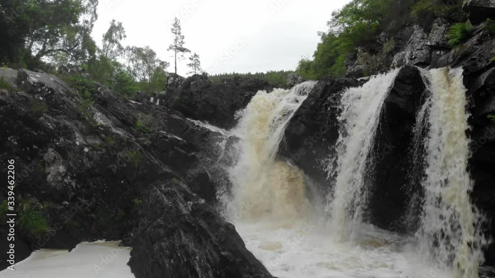 An aerial action shot showing th plunge pool of Rogie falls near ...