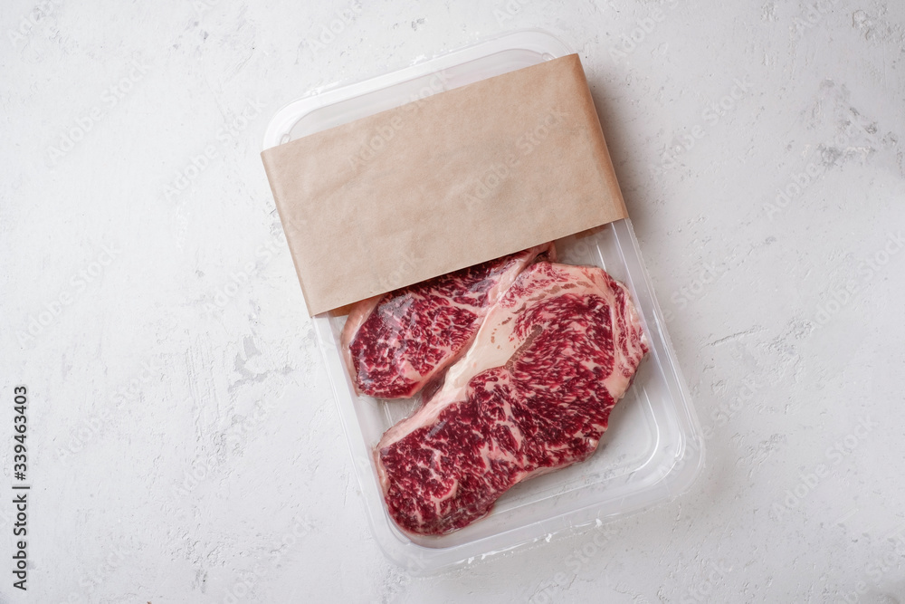Raw beef Striploin steak in vacuum packaging, mockup meat for the logo ...
