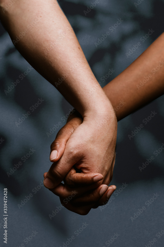 Holding hands Stock Photo | Adobe Stock