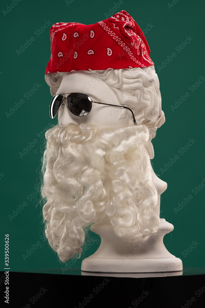 Statue of a bust of Apollo Belvedere with a long white beard in ...