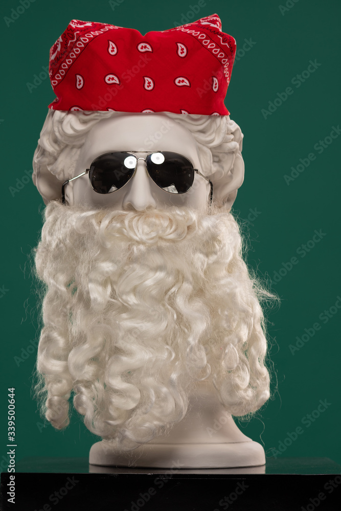 Statue of a bust of Apollo Belvedere with a long white beard in ...