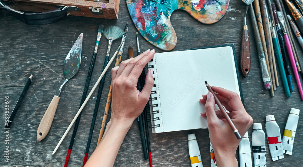 Female artist working Stock Photo | Adobe Stock