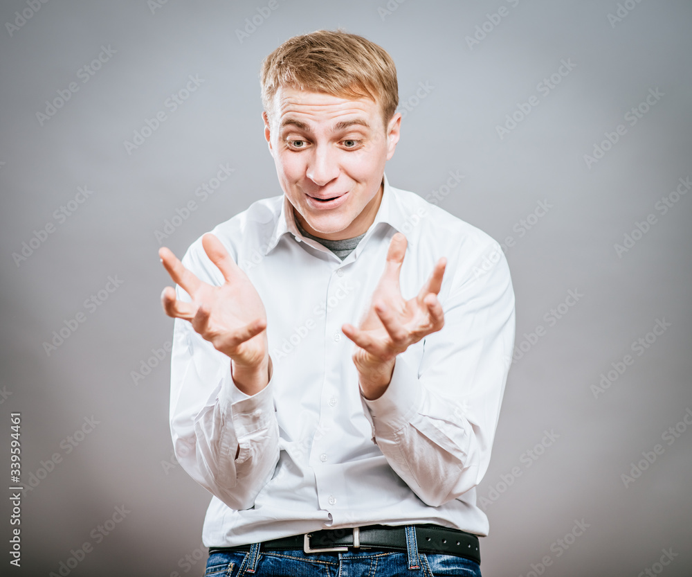 Closeup portrait, happy young handsome man looking shocked surprised in ...
