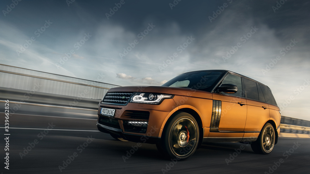 Range Rover Sport in the motion at the bridge. Fast driving british ...