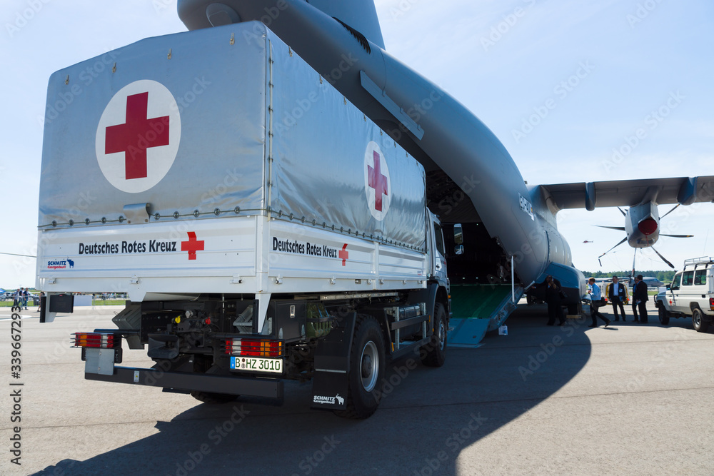 BERLIN, GERMANY - MAY 21, 2014: A car with the humanitarian aid of the ...