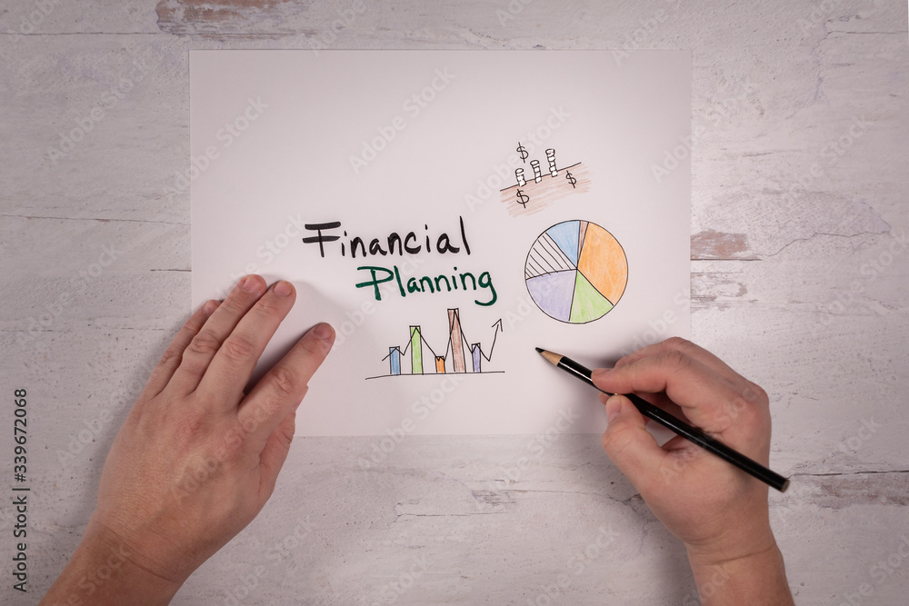 Financial planning sign with charts and diagrams on white paper with ...