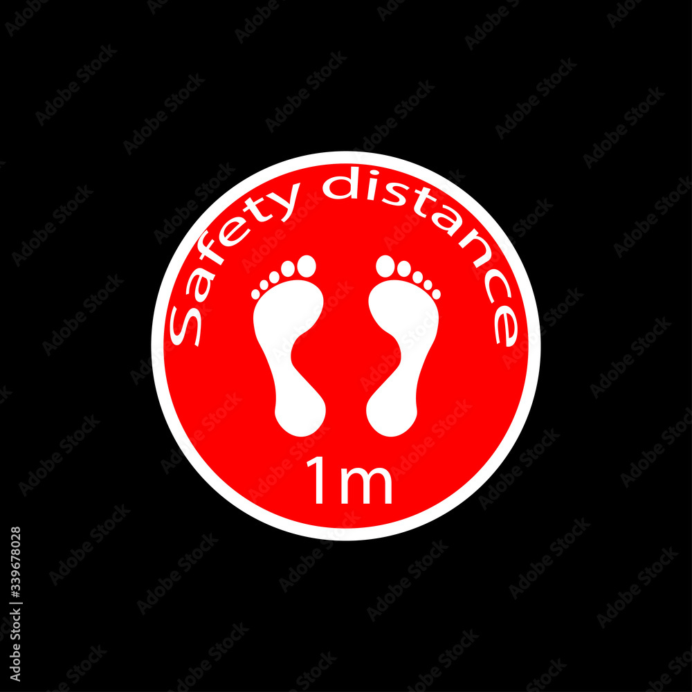 Safety distance of one meter in a red round sign with bare footprints ...