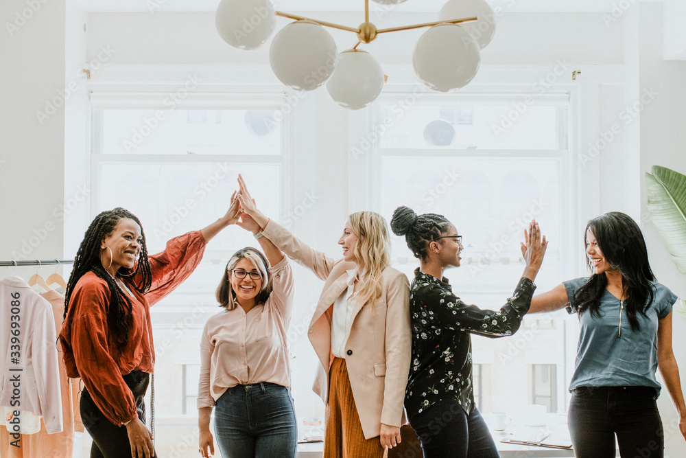Positive women teamwork Stock Photo | Adobe Stock