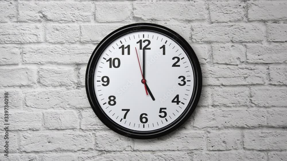The Time Is 5.00 AM Or PM On A Black Wall Clock With A Red Second Hand ...