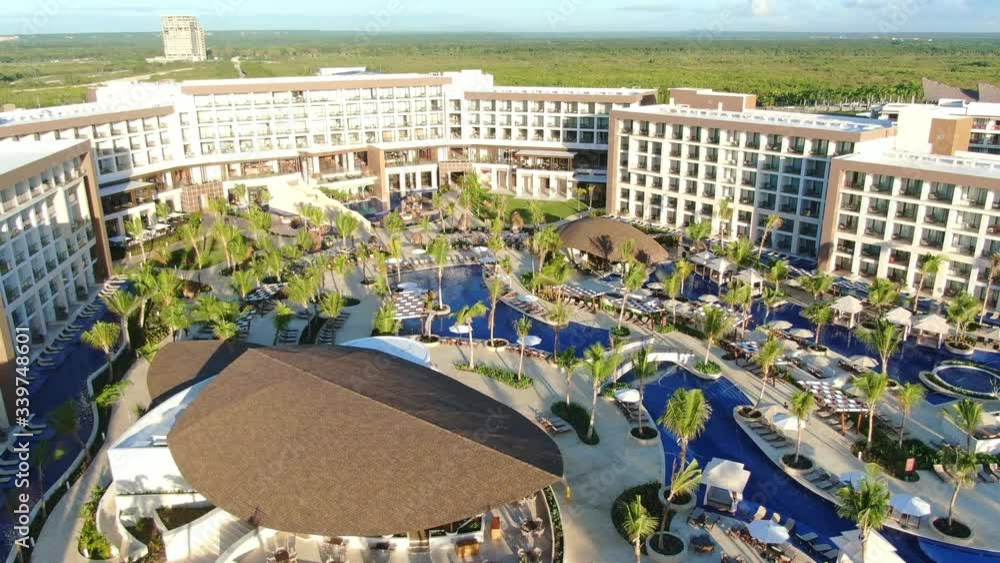 Swimming pool area in luxury vacation all-inclusive resort, aerial view ...