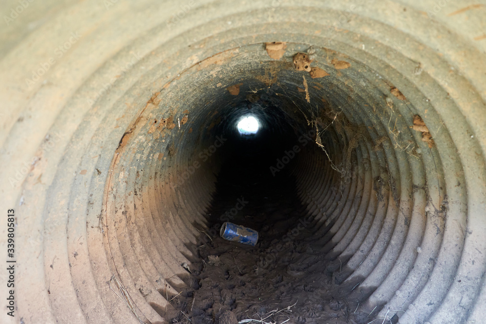 Inside view of Small culvert under a farm to market road in Texas Stock ...