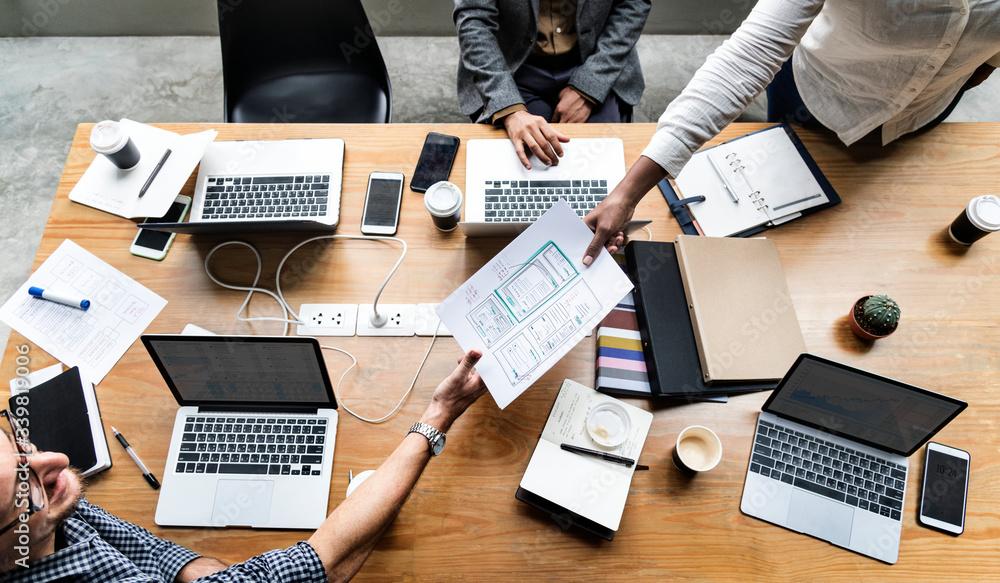 Group of people working on website template Stock Photo | Adobe Stock