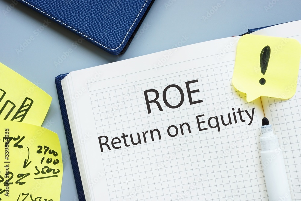 The photo shows Return on Equity ROE. Notepad, heap, marker. Stock ...