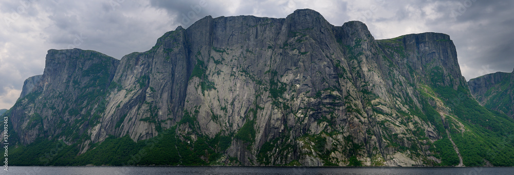 Panorama of steep rock cliffs of fjords on Western Brook Pond at Gros ...