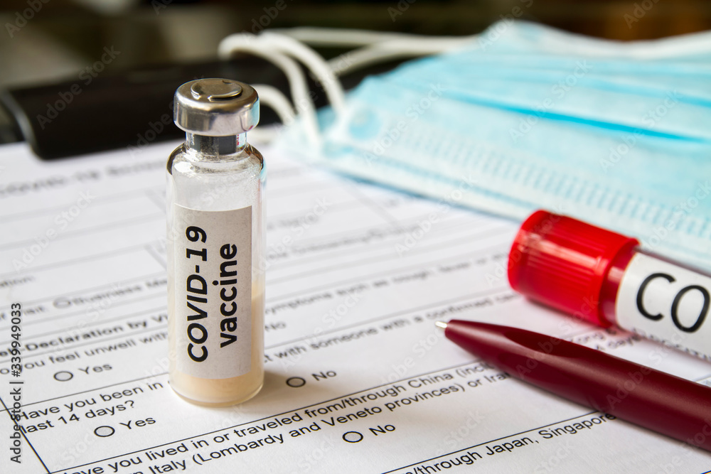 Vaccine bottle to protect from Covid-19 lies on the part of COVID-19 ...