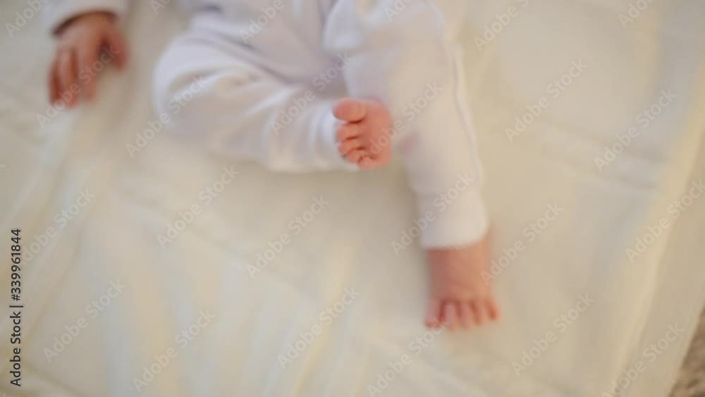 Feet of newborn baby. Funny little feet of neonatal three weeks old ...