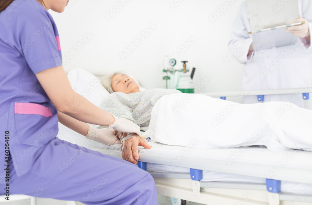 nurse use hand screening vital sign of old asian patient , doctor and ...