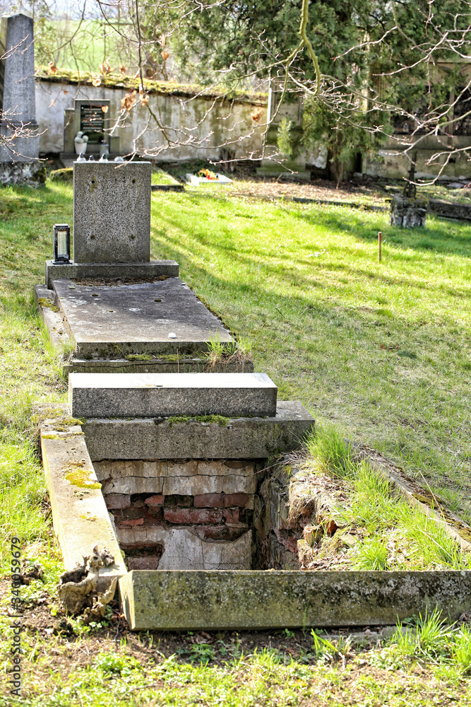 Open Grave With Tombstone